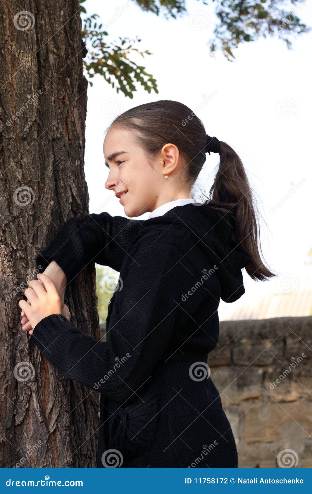 Portrait girl near a tree. stock photo. Image of brick - 11758172
