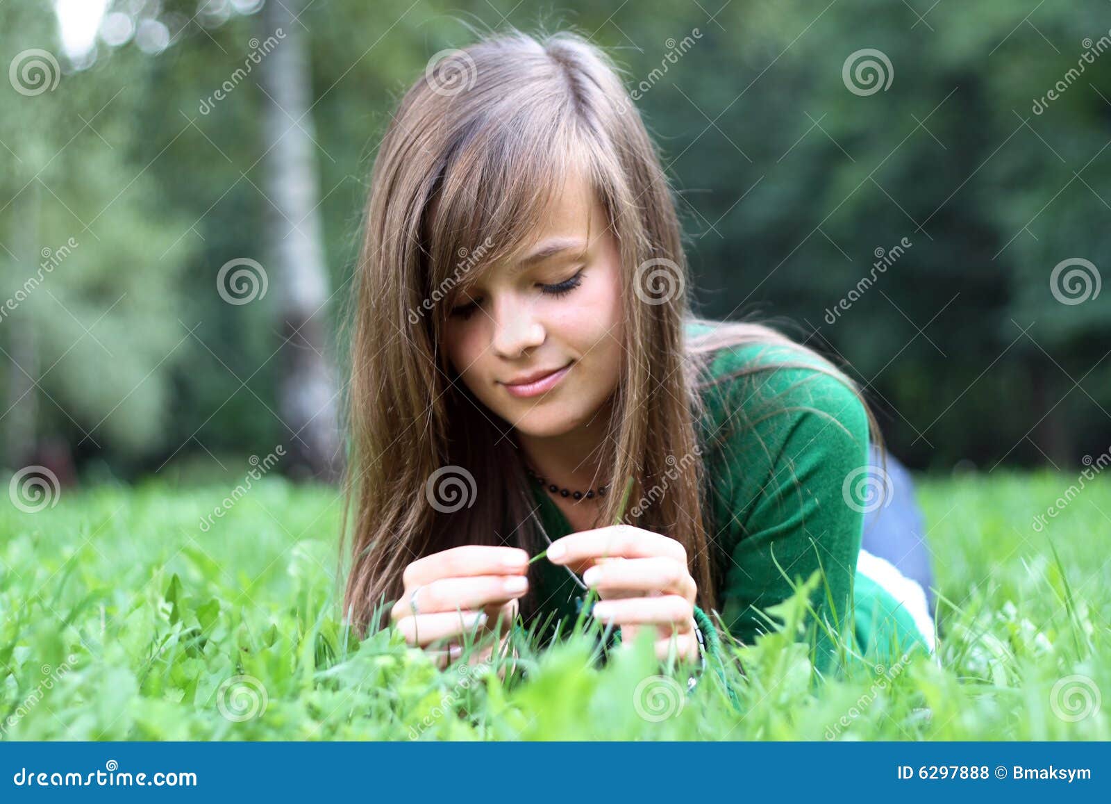 A Portrait of a Gorgeous Girl on the Grass Stock Photo - Image of ...
