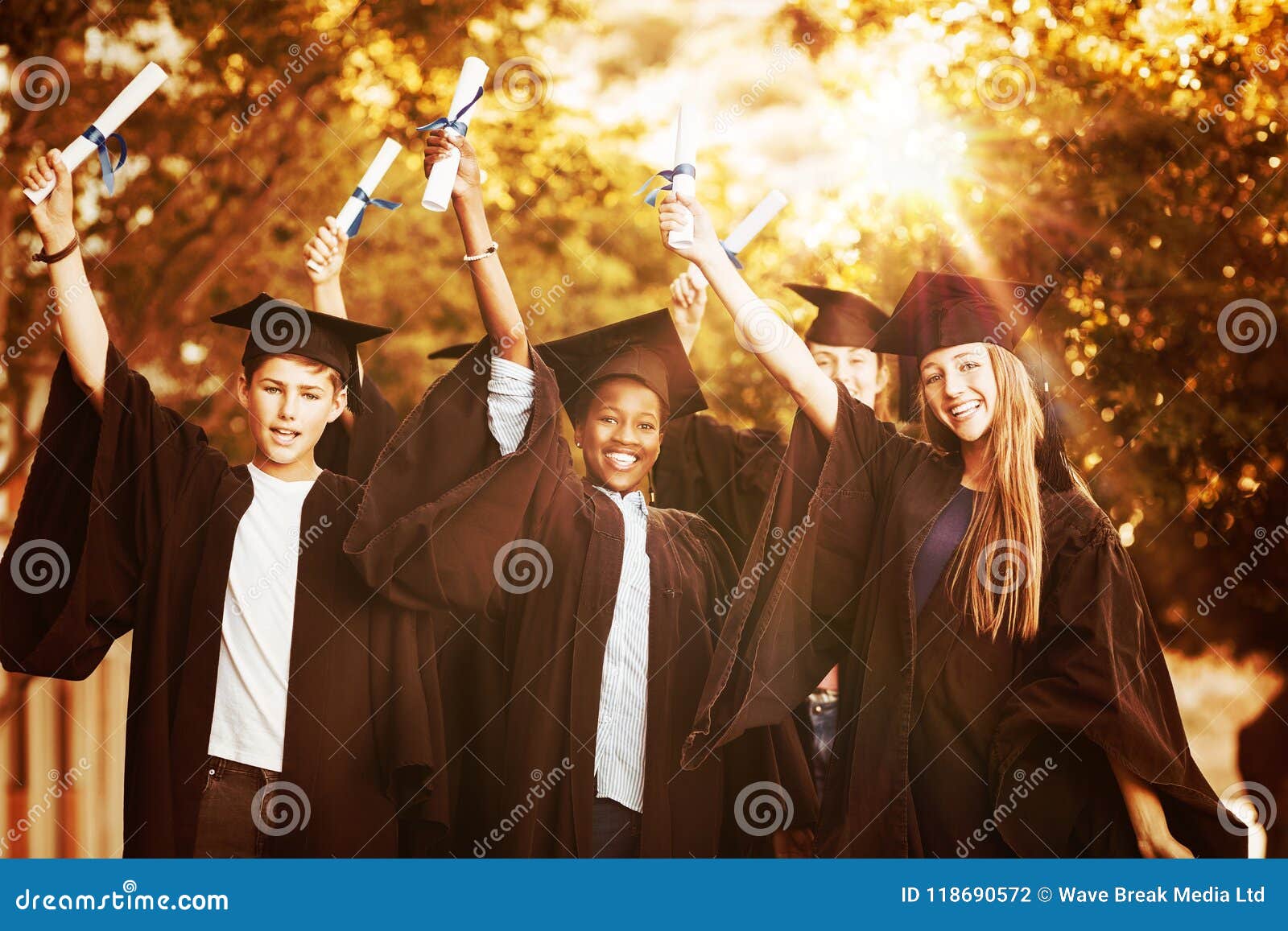 Portrait of Graduate School Kids Standing with Degree Scroll in Campus ...