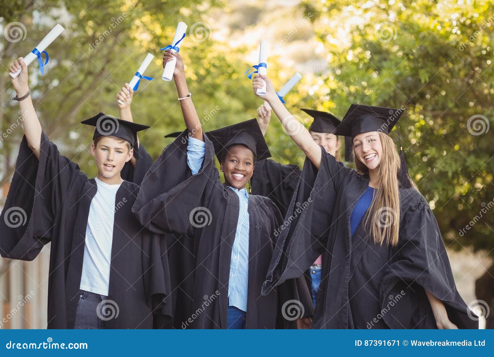 Portrait of Graduate School Kids Standing with Degree Scroll in Campus ...