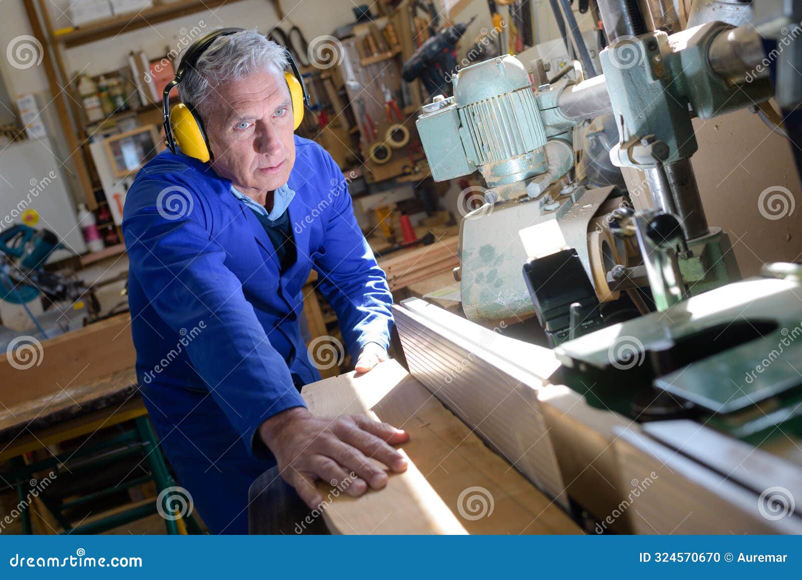 Portrait Grey-haired Carpenter Using Saw Stock Photo - Image of ...