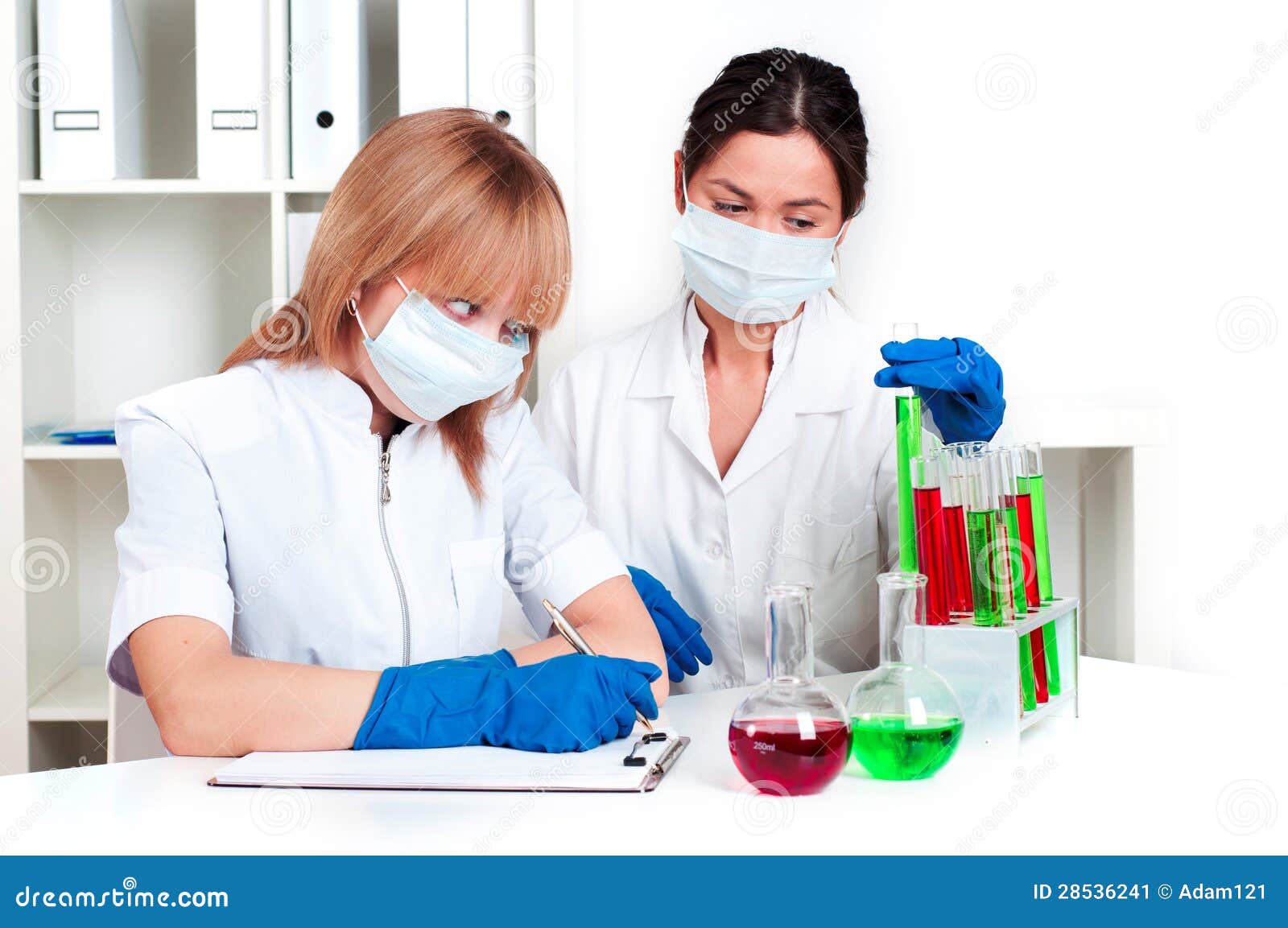 Portrait of group chemists stock image. Image of adult - 28536241