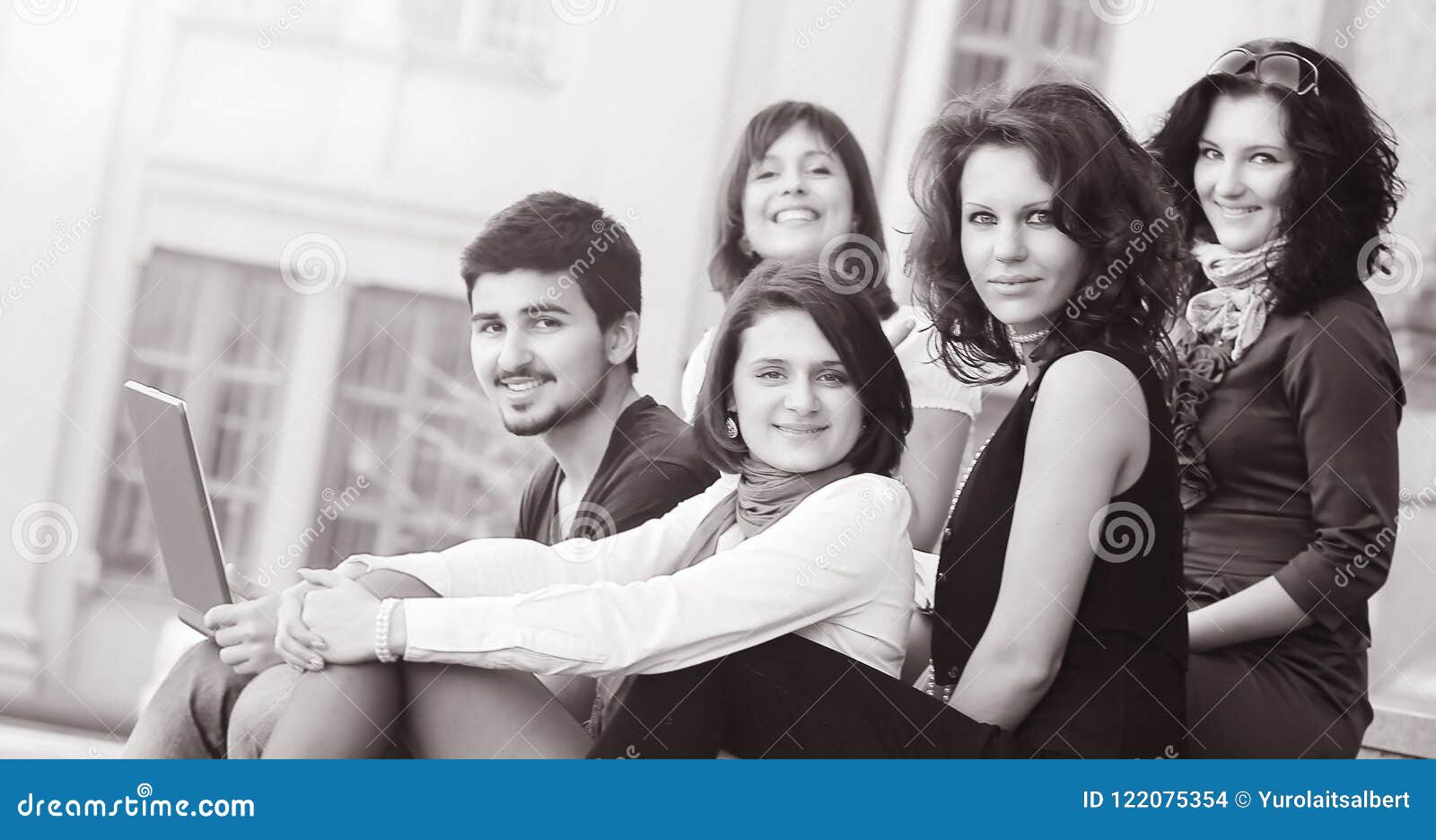 Portrait of a Group of Students Sitting in Front of the University ...