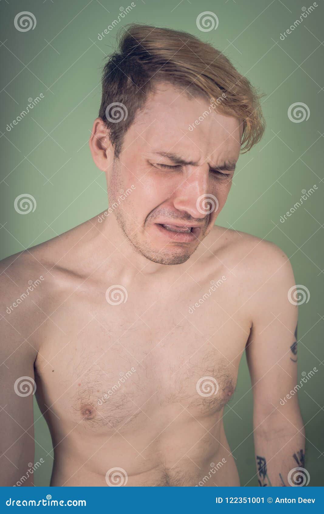 Guy Crying on Green Background Stock Image - Image of crying, hair ...