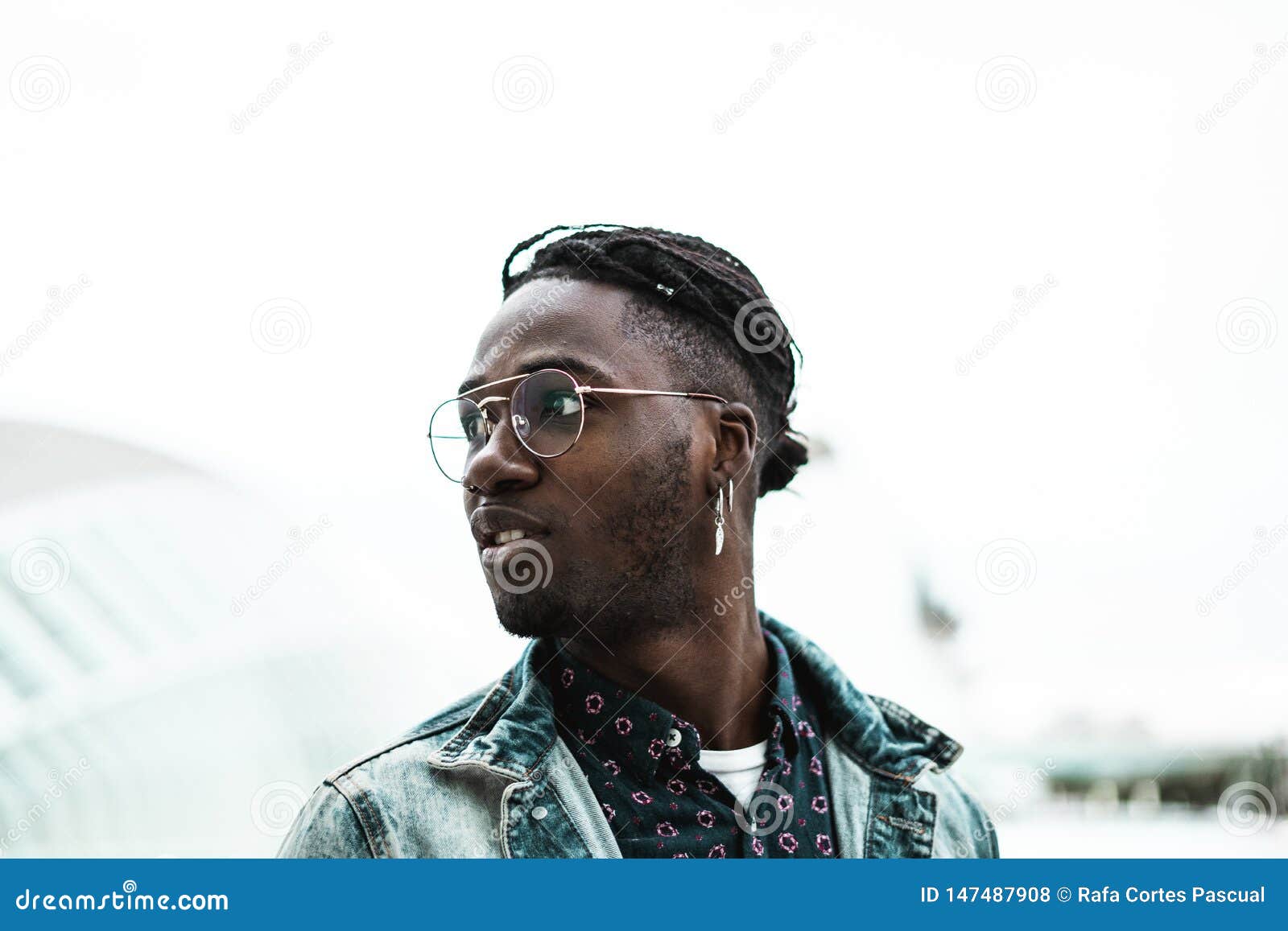 Portrait Of Handsome African American Man Smiling In The Street With