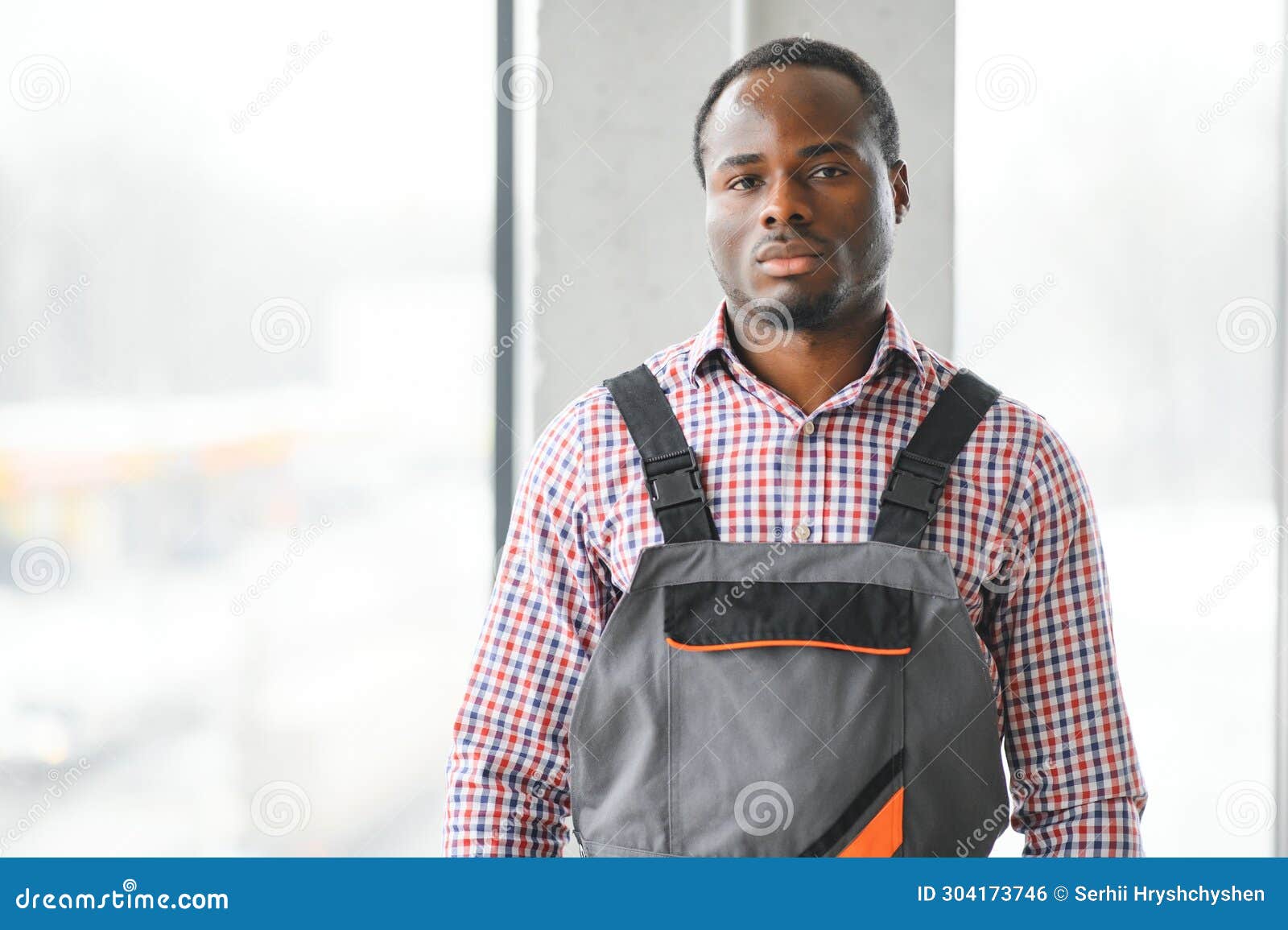 Portrait of Handsome African Worker or Engineer in Overalls and Hard ...