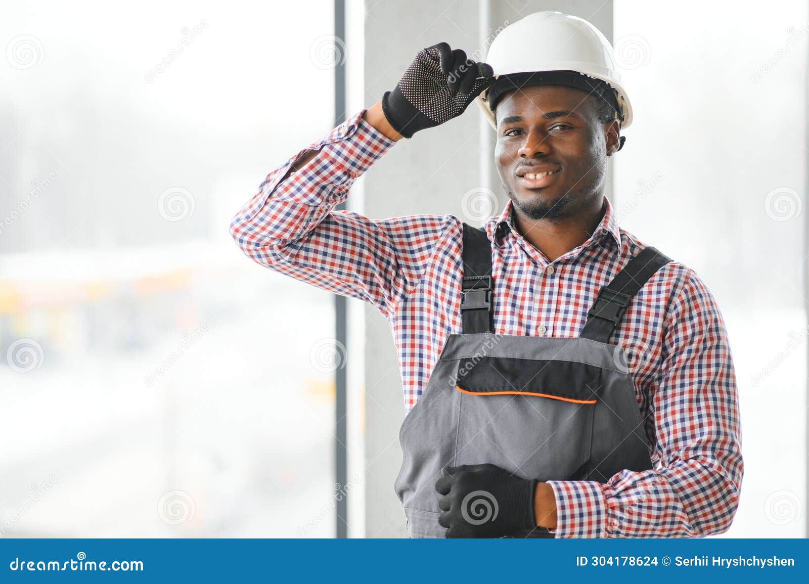 Portrait of Handsome African Worker or Engineer in Overalls and Hard ...