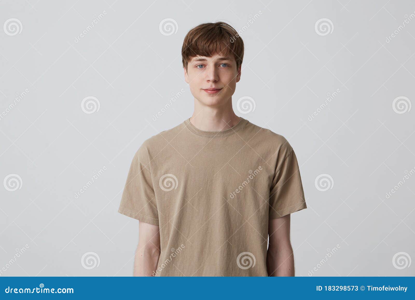 Portrait of Handsome Attractive Young Man with Short Haircut and Blue ... Portrait of Handsome Attractive Young Man with Short Haircut and Blue ...
