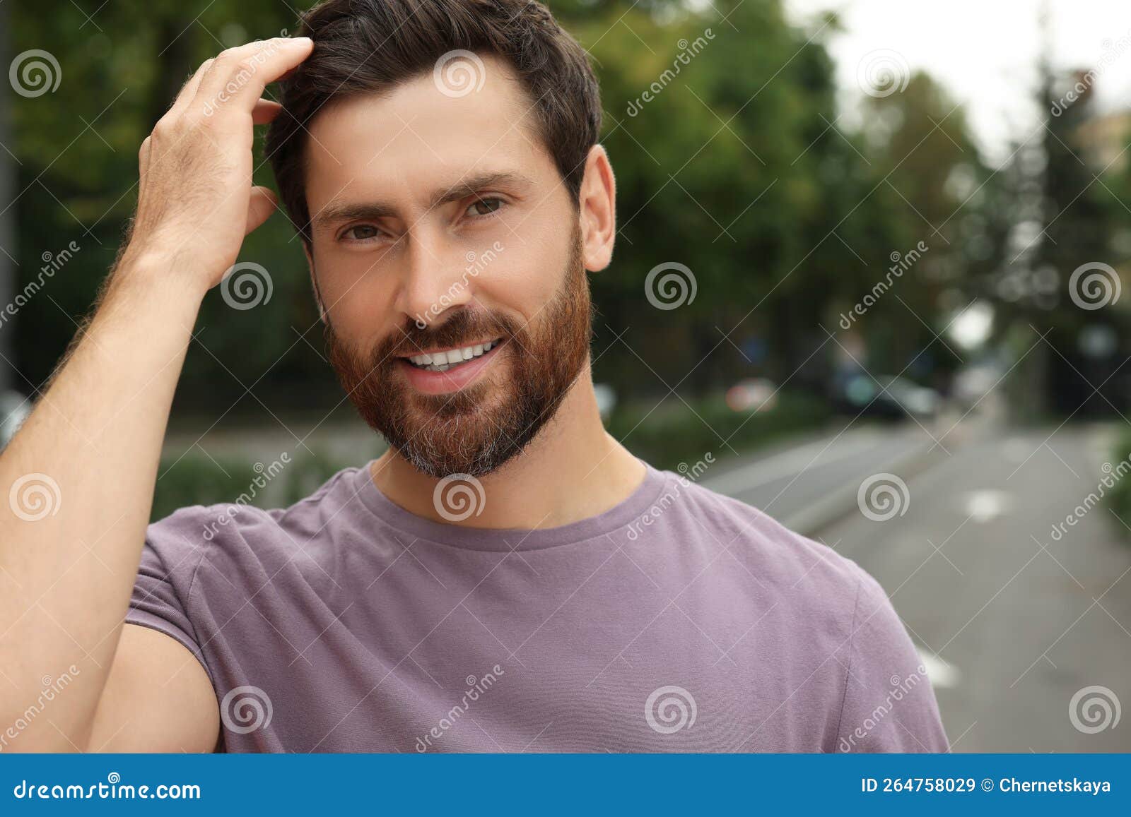 Portrait Of Handsome Bearded Man On Street Space For Text Stock Image