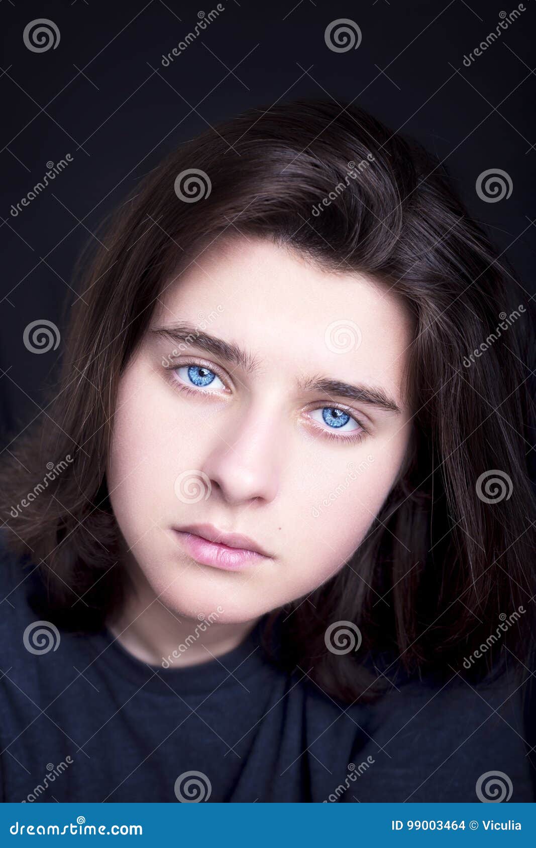 A Portrait of a Handsome Blue Eyes Teenager on Dark Background Stock ... A Portrait of a Handsome Blue Eyes Teenager on Dark Background Stock ...