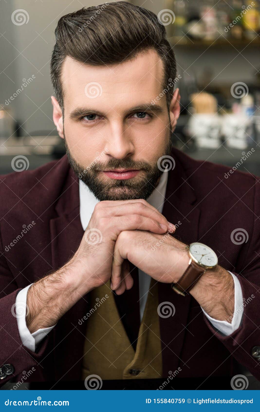Portrait of Handsome Businessman in Formal Wear with Folded Hands ... Portrait of Handsome Businessman in Formal Wear with Folded Hands ...