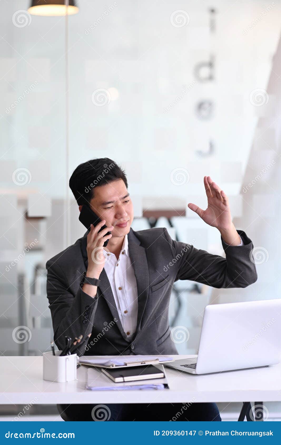 Portrait of Handsome Businessman in a Phone Call Talking and Explaining ...
