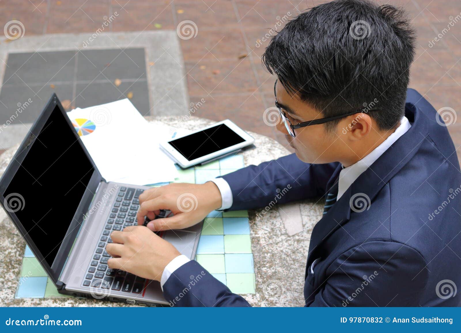 Portrait of Handsome Businessman Using Laptop Computer for His Work at ...
