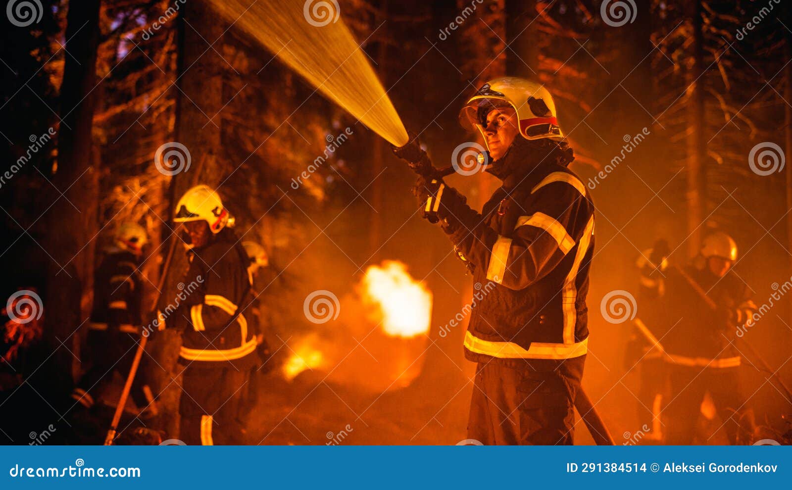 Portrait of a Handsome Caucasian Professional Firefighter Methodically ...