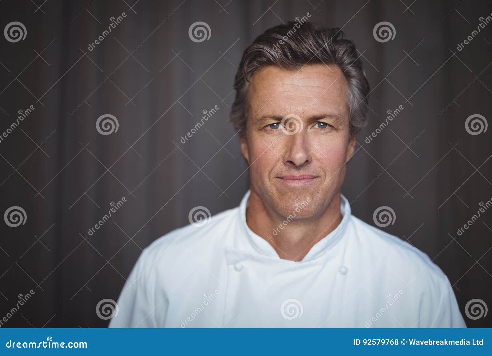 Portrait of handsome chef stock photo. Image of mature - 92579768