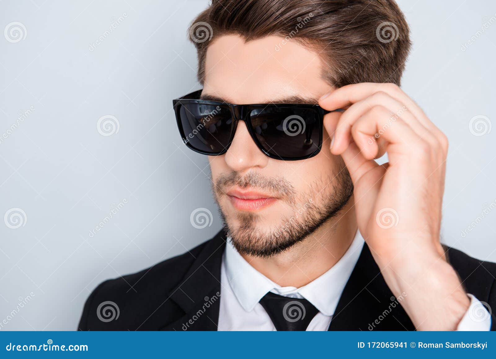 Portrait of Handsome Confident Man Touching His Glasses Stock Image ...