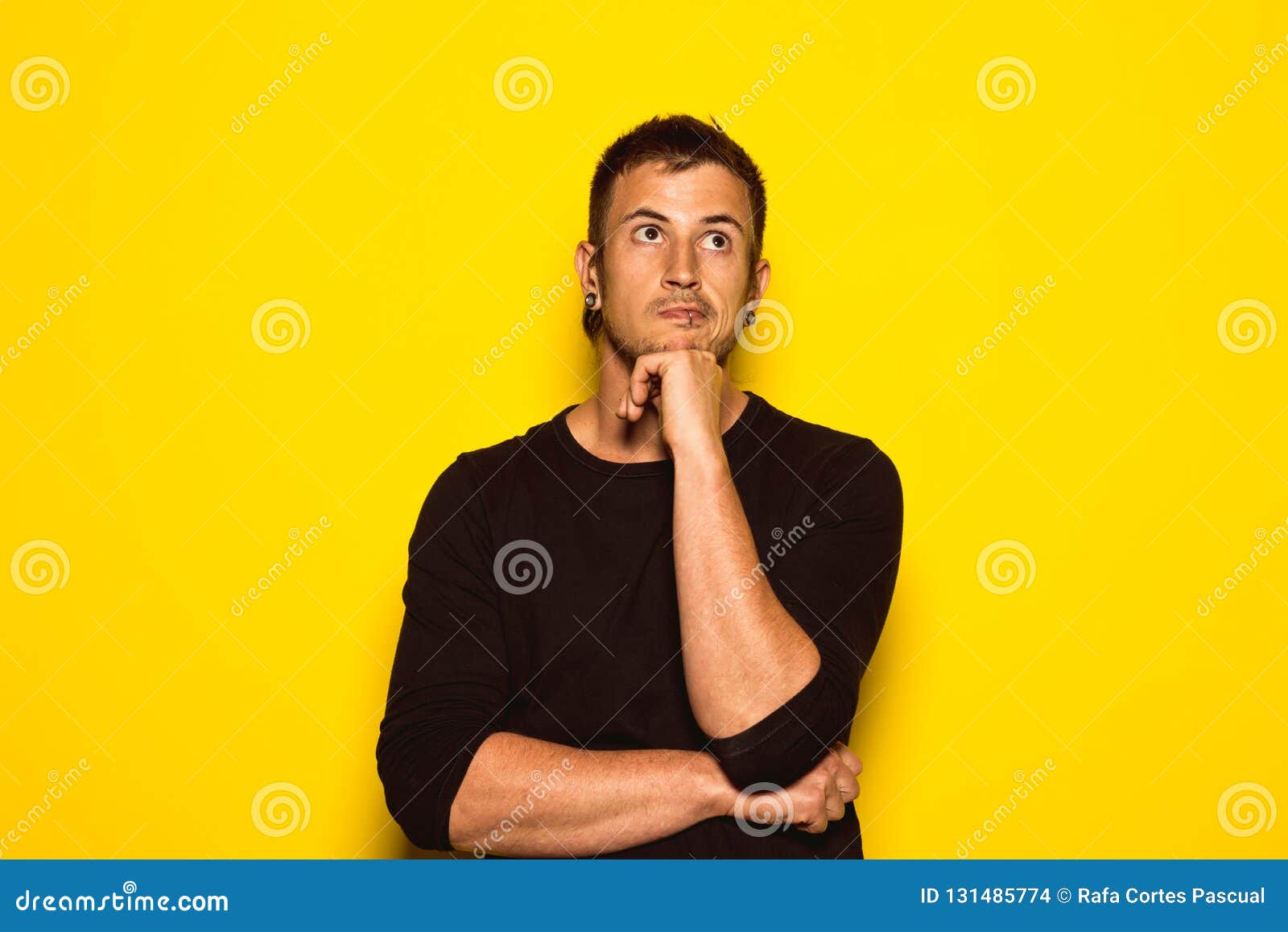 Portrait of a Handsome Guy Thinking and Looking Up Stock Photo - Image ...