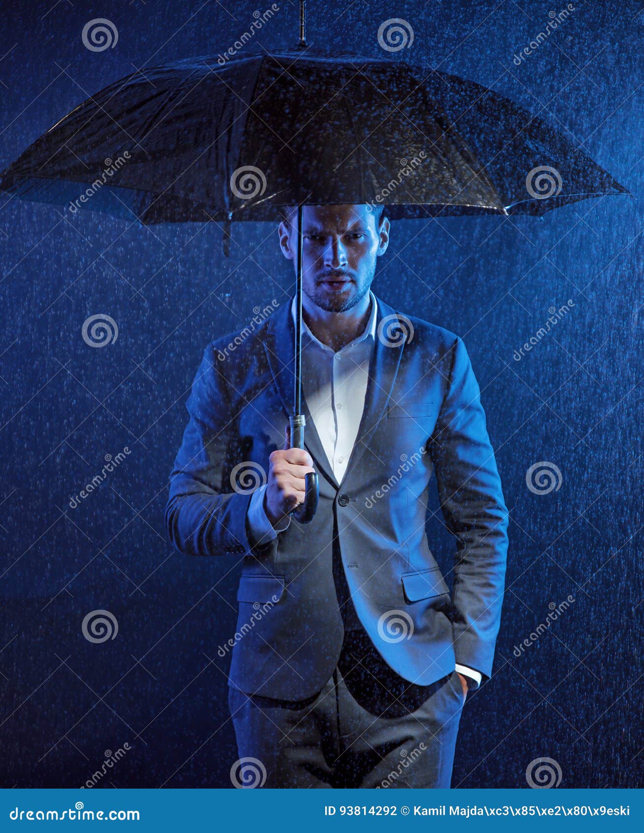 Sad Man Standing In Rain