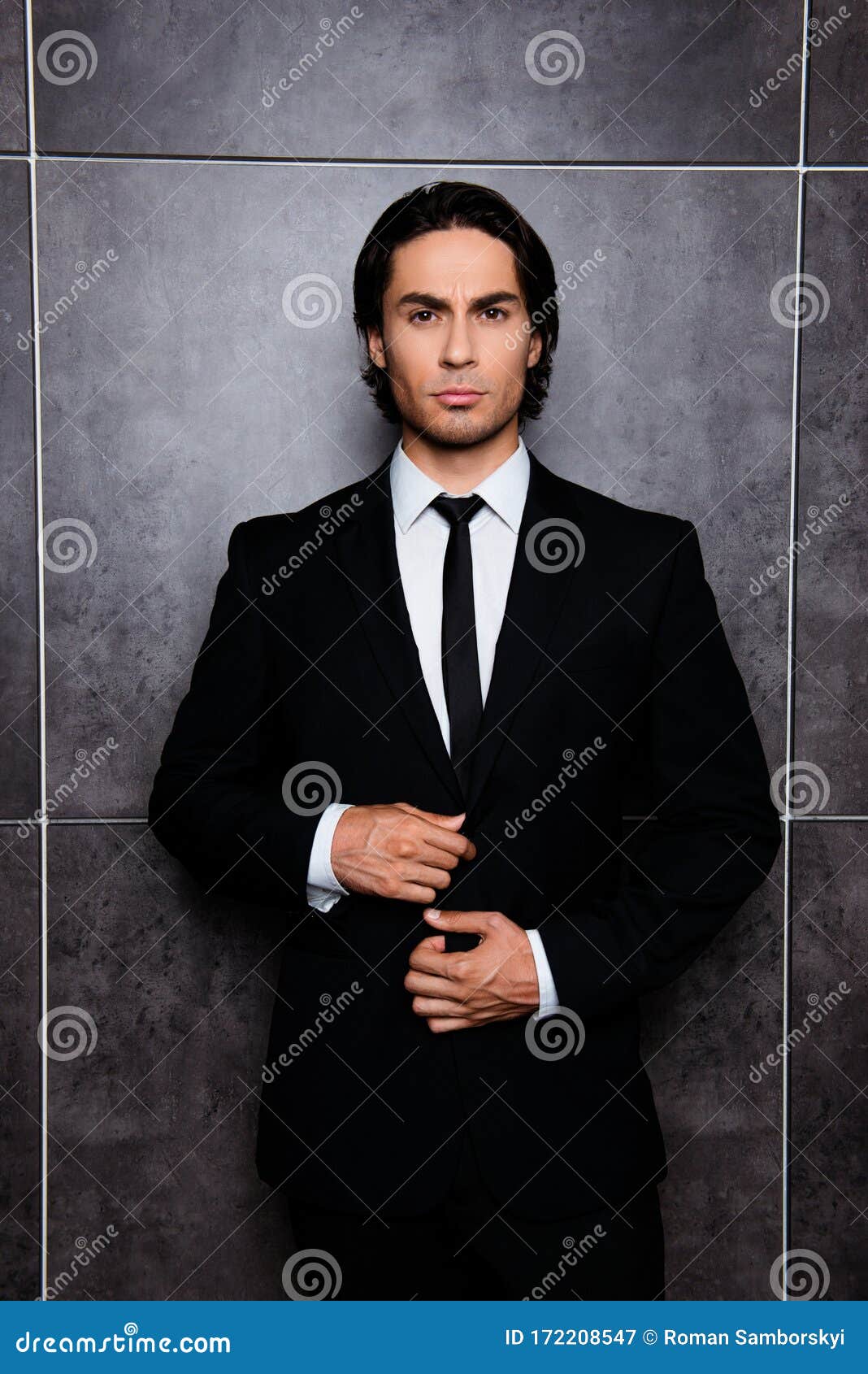 Portrait of Handsome Hispanic Man Buttoning His Jacket Stock Image ...