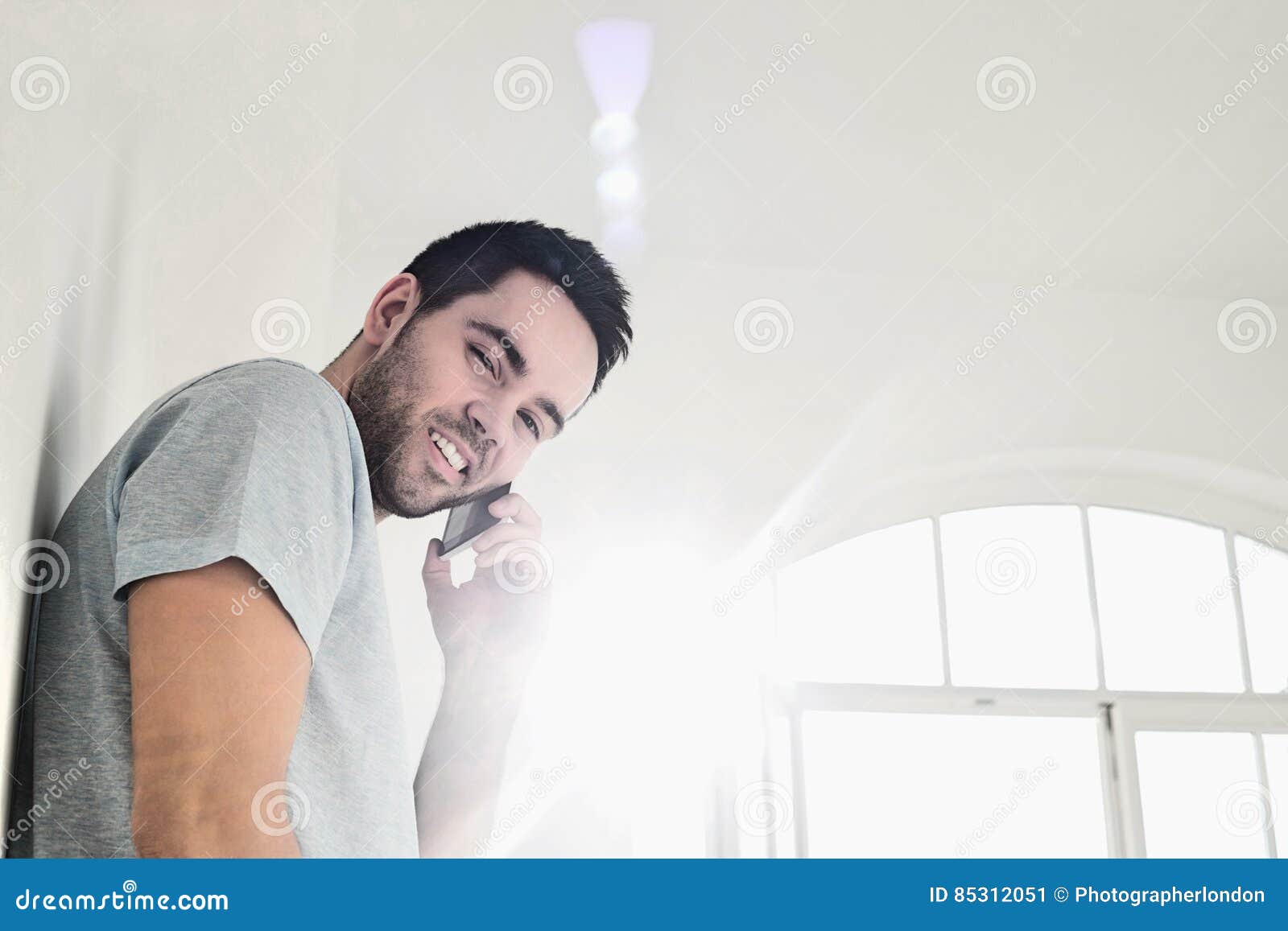 Portrait of Handsome Man on Call at Home Stock Image - Image of looking ...