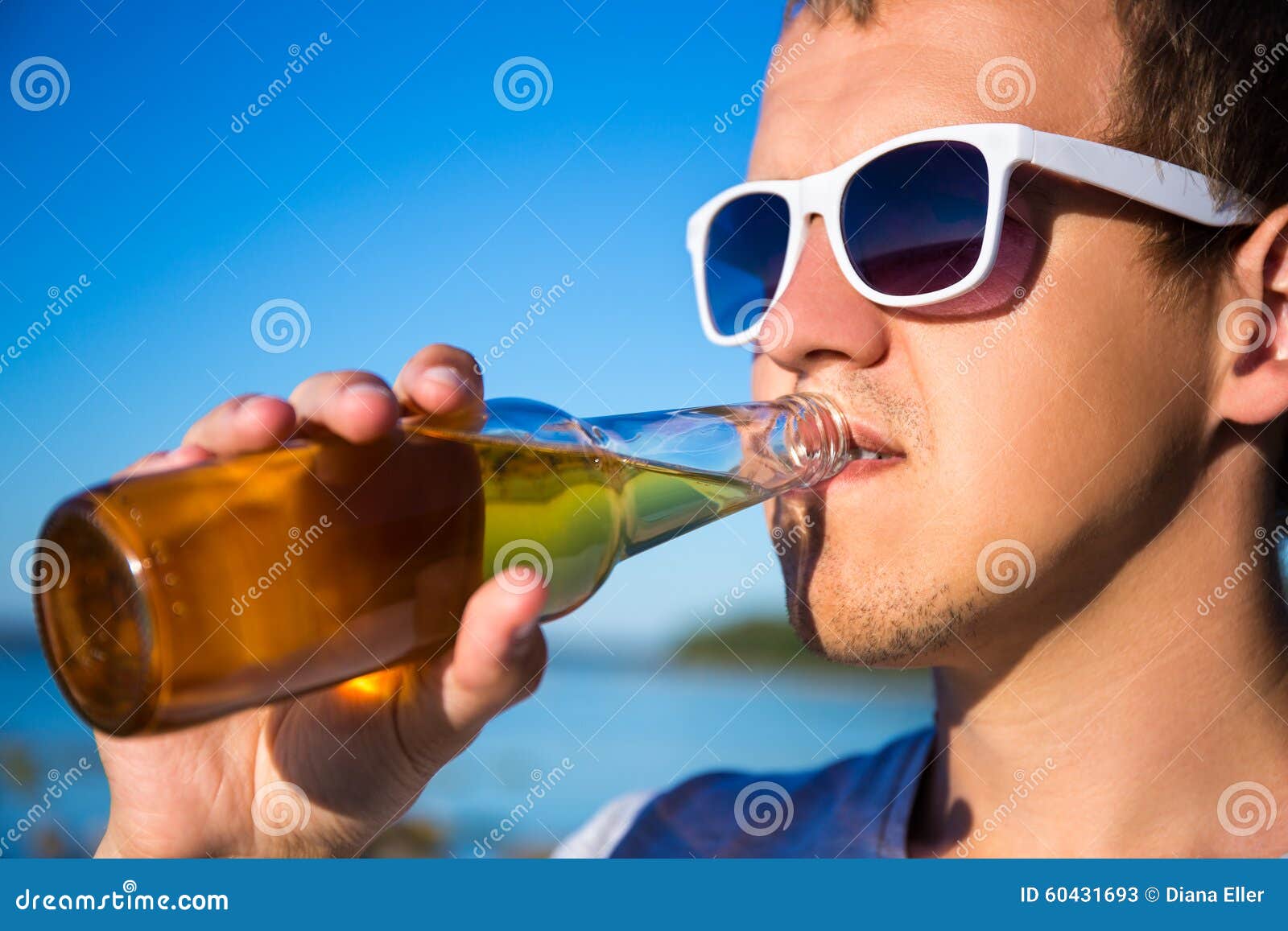 Portrait of Handsome Man Drinking Beer on the Beach Stock Image - Image ... Portrait of Handsome Man Drinking Beer on the Beach Stock Image - Image ...
