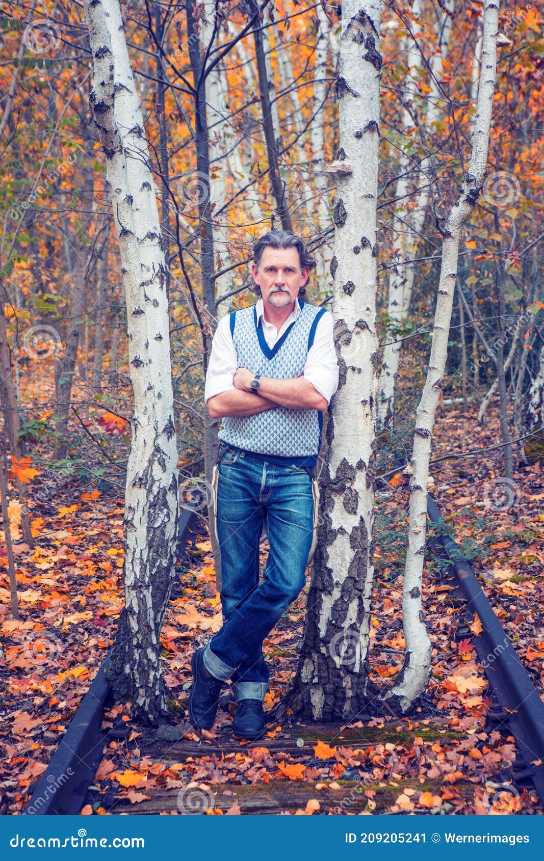 Portrait of Handsome Man in His 50s Standing in Forest Stock Image ...