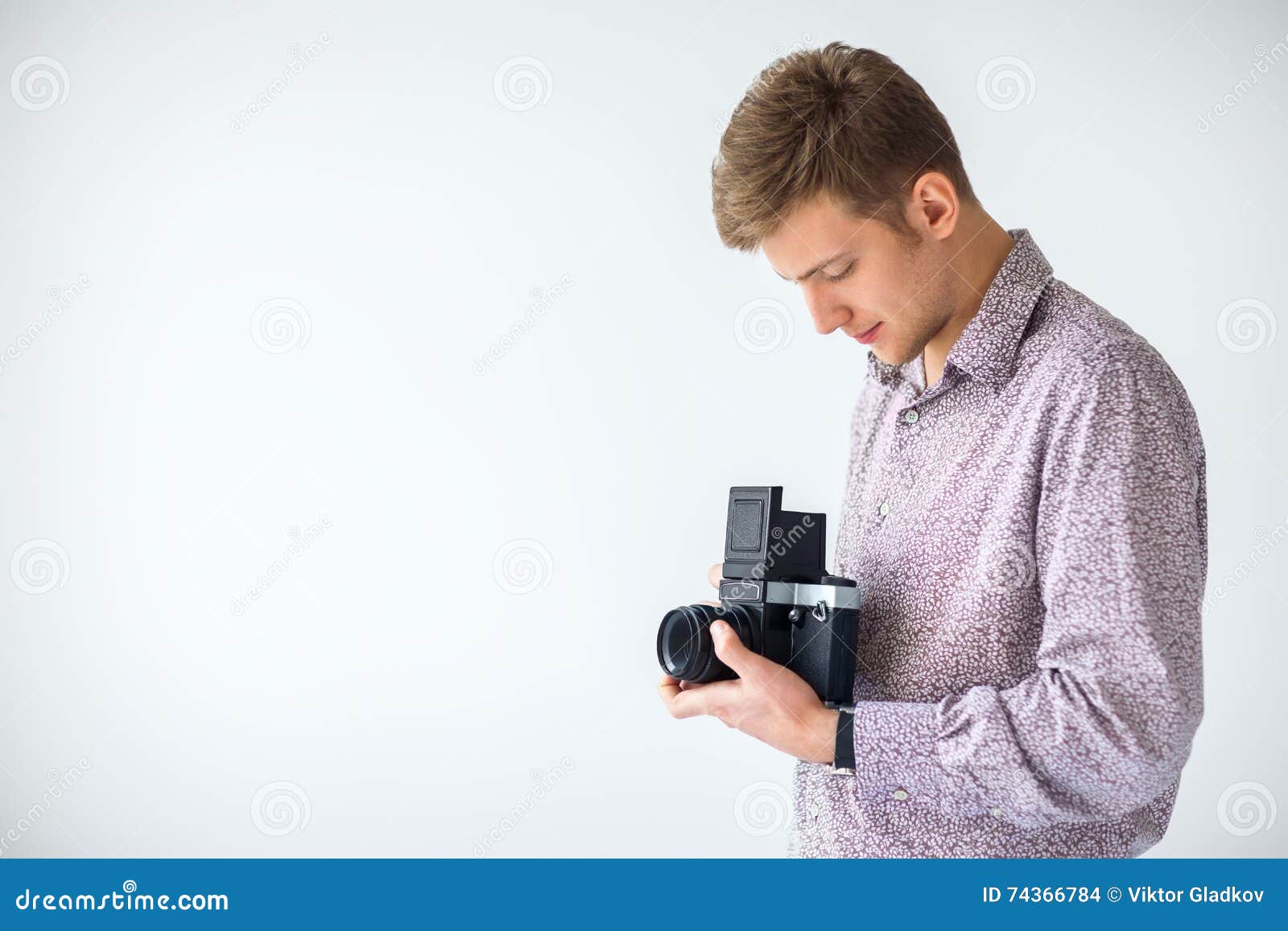 Portrait of Handsome Man with Old Medium Format Camera in Studio Stock ...