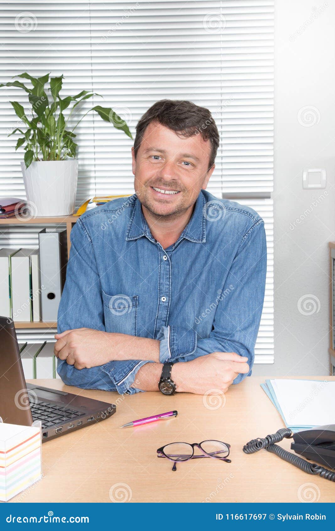 Handsome Man Sitting at His Desk in the Office Stock Image - Image of ...