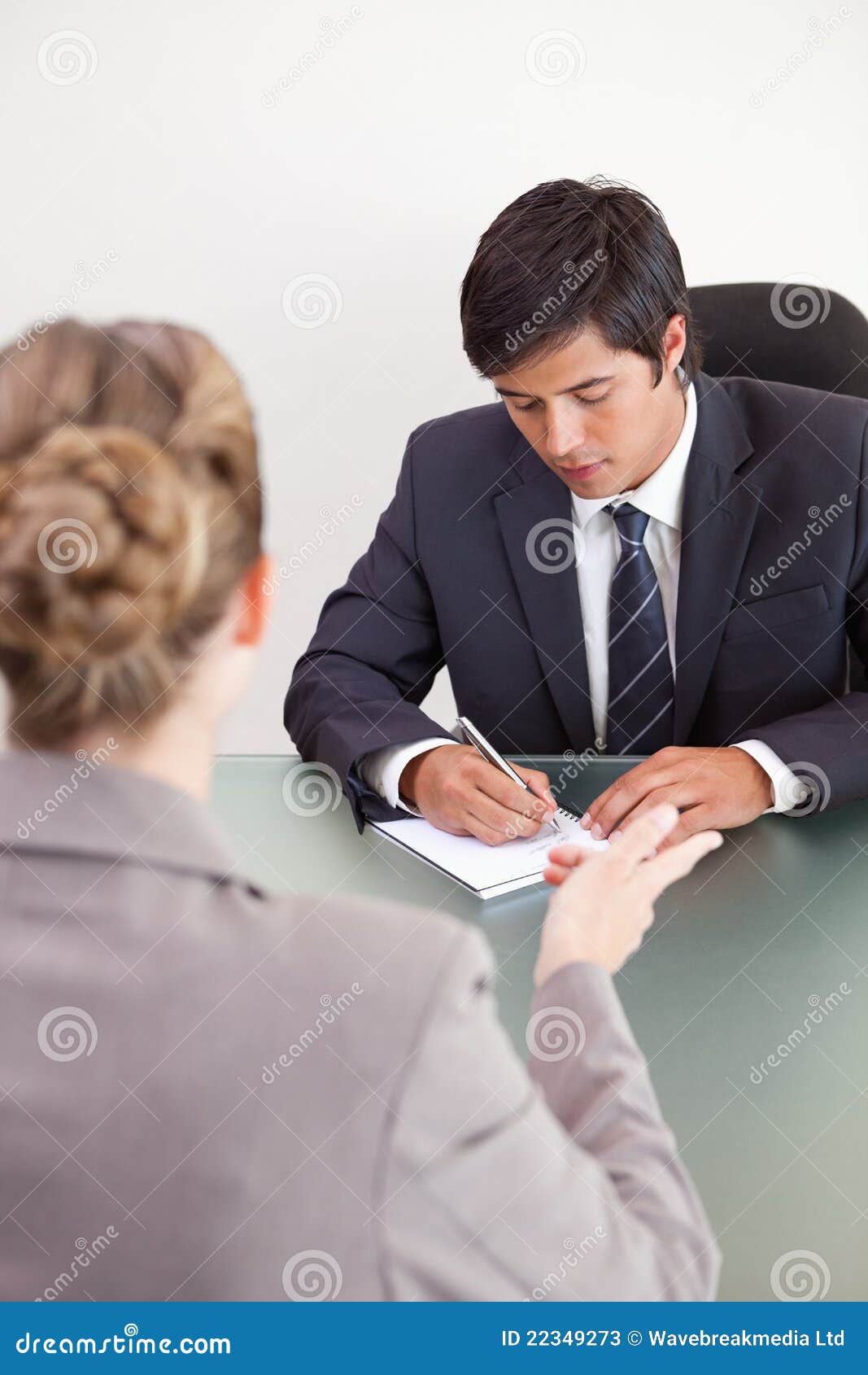 Portrait of a Handsome Manager Interviewing a Female Applicant Stock ...