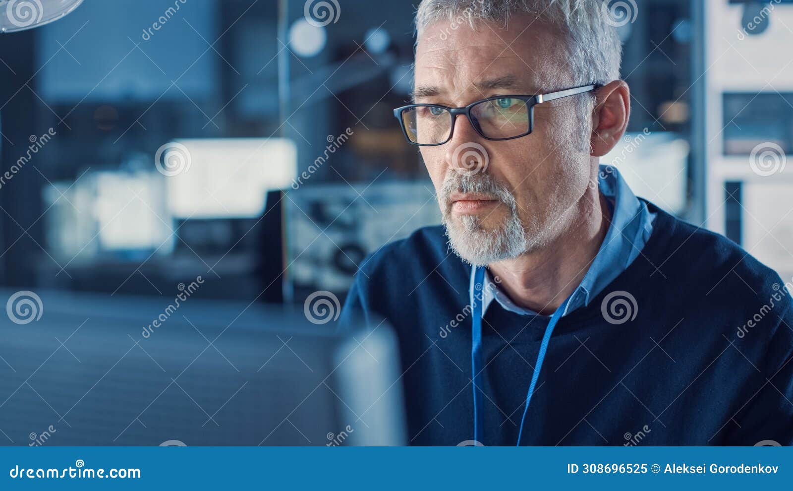 Portrait of Handsome Middle Aged Engineer Wearing Glasses Works on ...