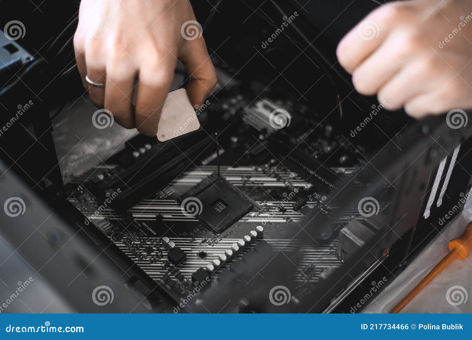 Handsome Nerd Man is Servicing Computer Motherboard and Cooler. Stock ...