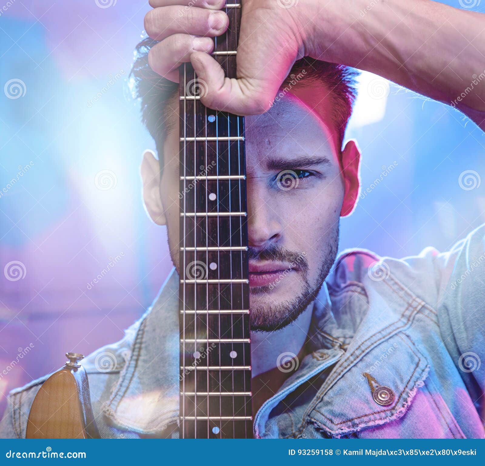 Portrait of a Handsome Performer Holding a Guitar Stock Photo - Image ...