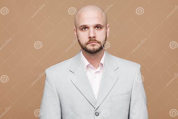 Portrait Of Handsome Sad Despair Middle Aged Bald Bearded Businessman