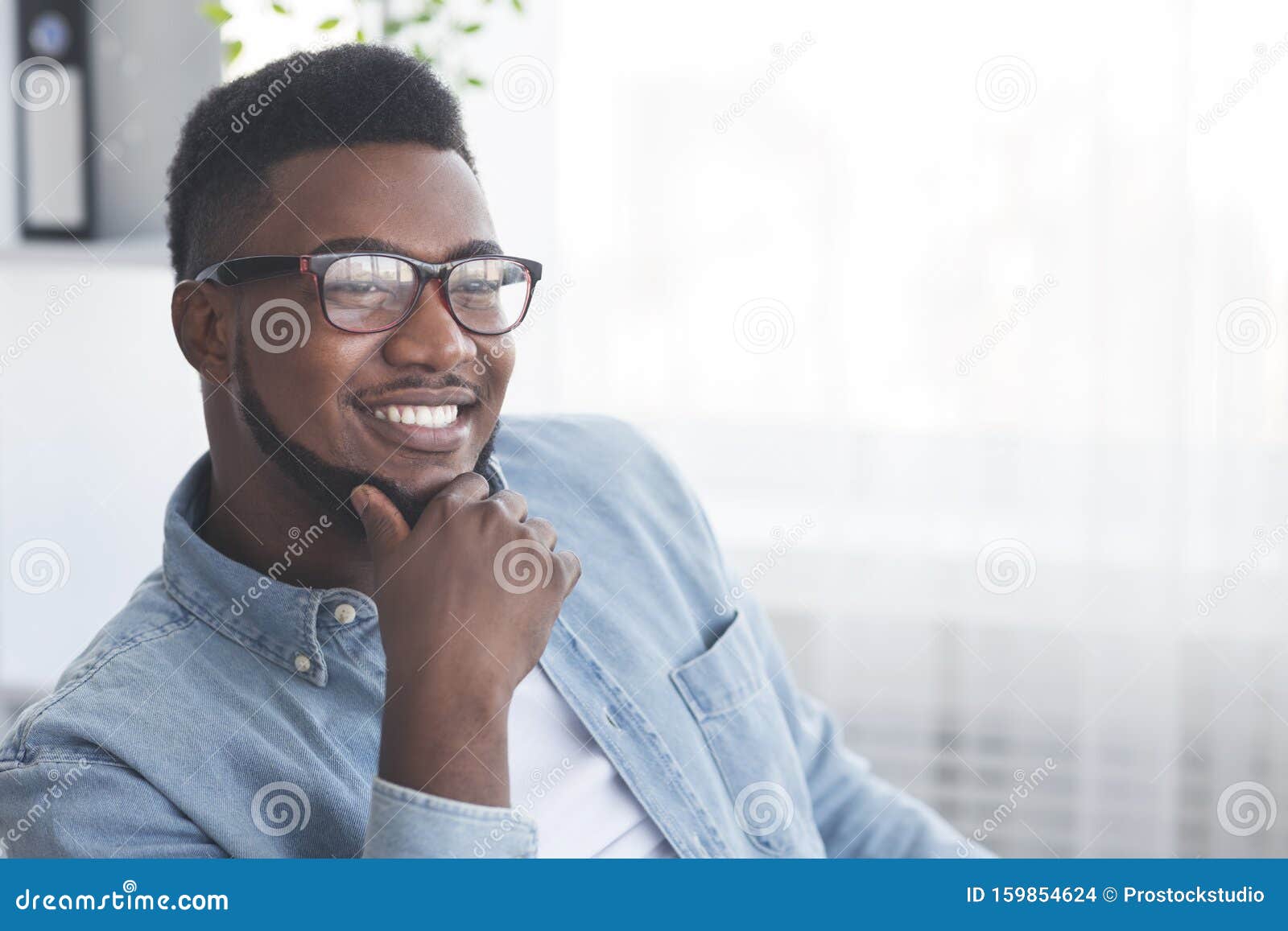 Portrait Of Handsome Smiling African American Man In Glasses Stock