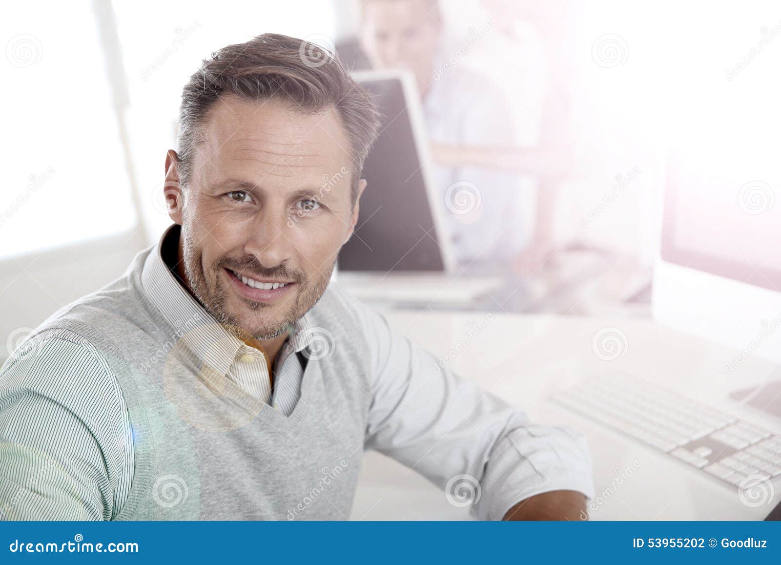 Portrait of Handsome Smiling Man at Office Stock Photo - Image of ...