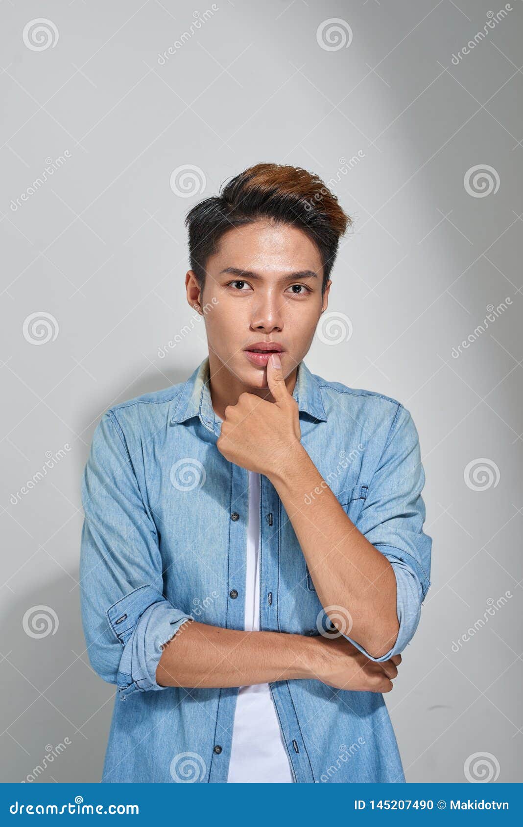 Portrait of Handsome Young Asian Guy Posing in Studio Stock Photo ...