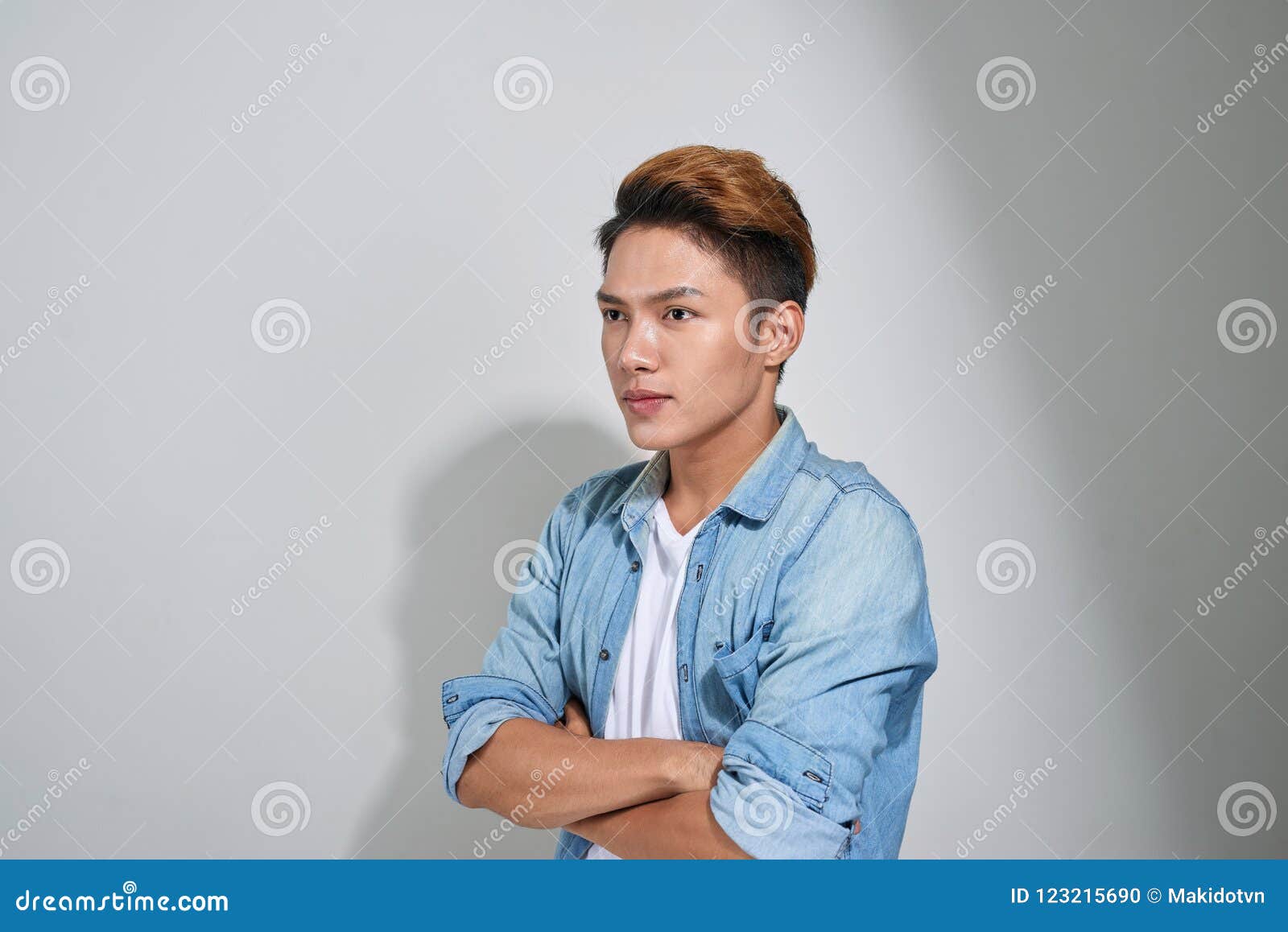 Portrait of Handsome Young Asian Guy Posing in Studio. Stock Photo ...