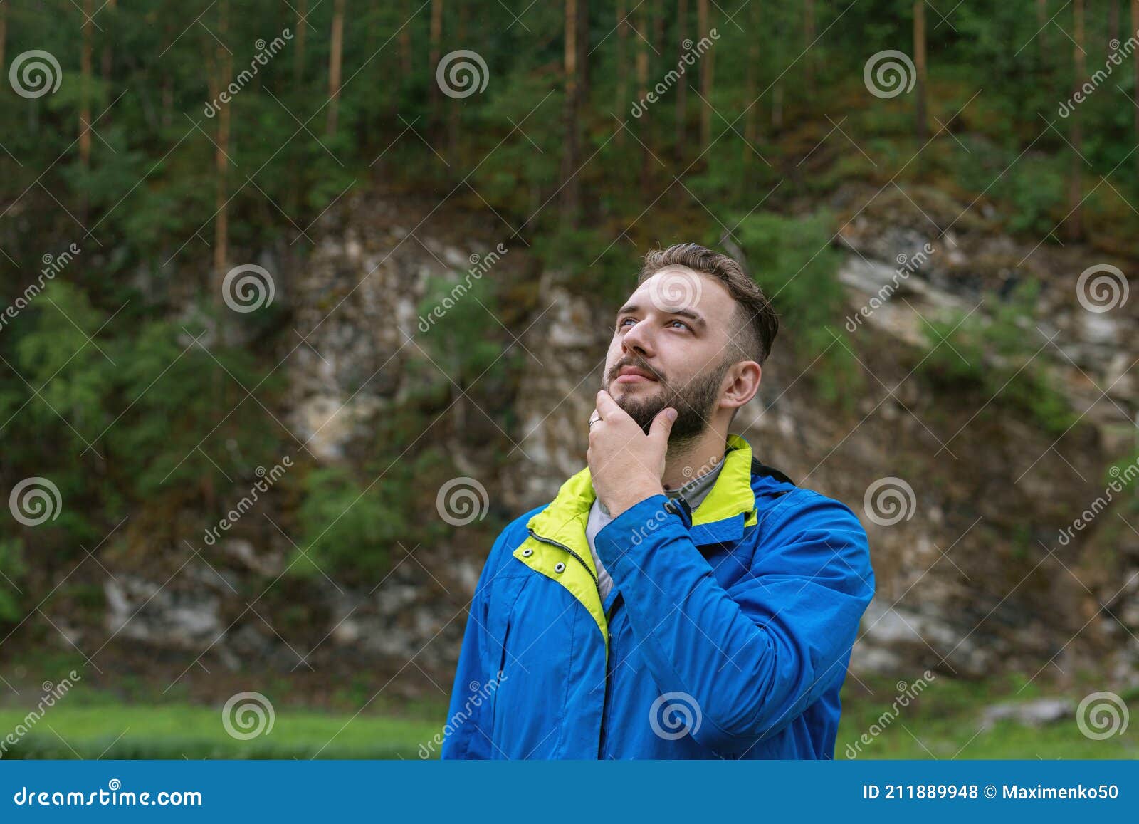 Portrait of Handsome Young Bearded Man Looking Up Thoughtfully in Sky ...