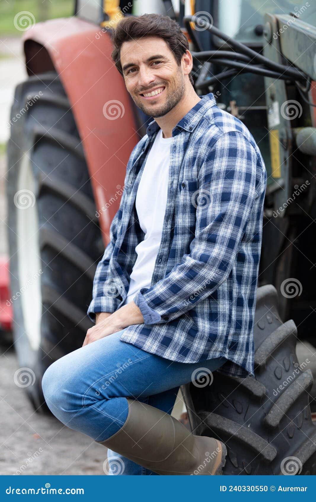 Portrait Handsome Young Farmer Siting Against Tractor Stock Photo ...