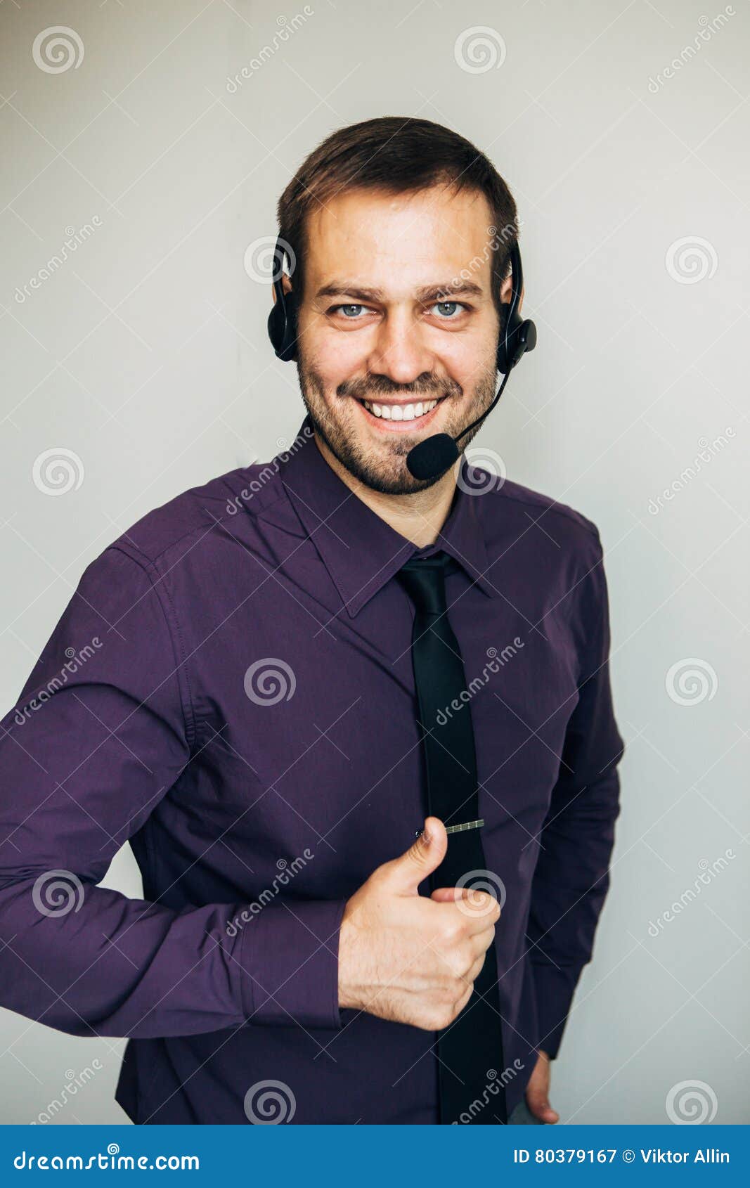 Portrait of Handsome Young Male Operator in Headset Looking at Camera ...