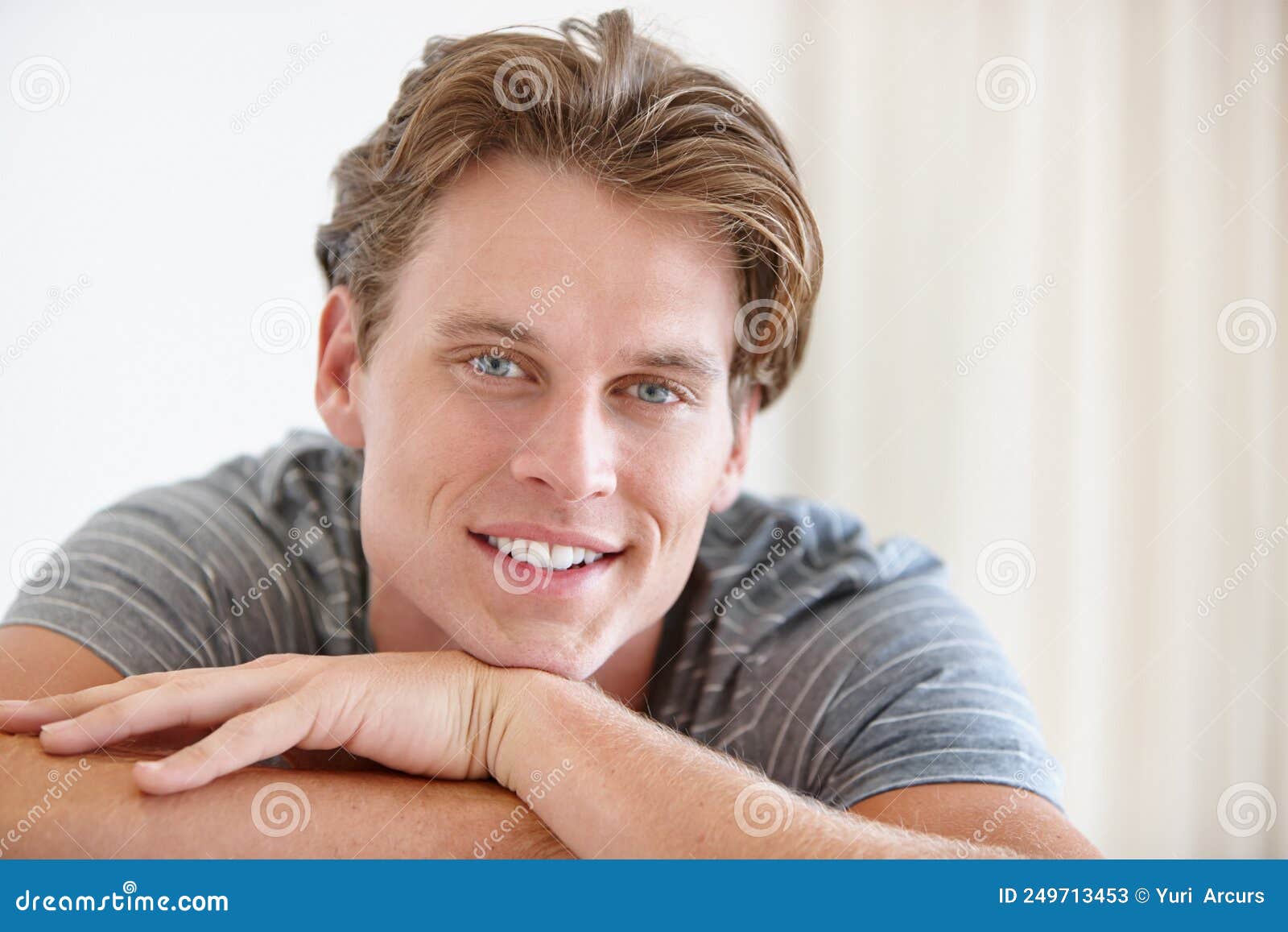 Casual and Carefree. Portrait of a Handsome Young Man at Home. Stock ... Casual and Carefree. Portrait of a Handsome Young Man at Home. Stock ...
