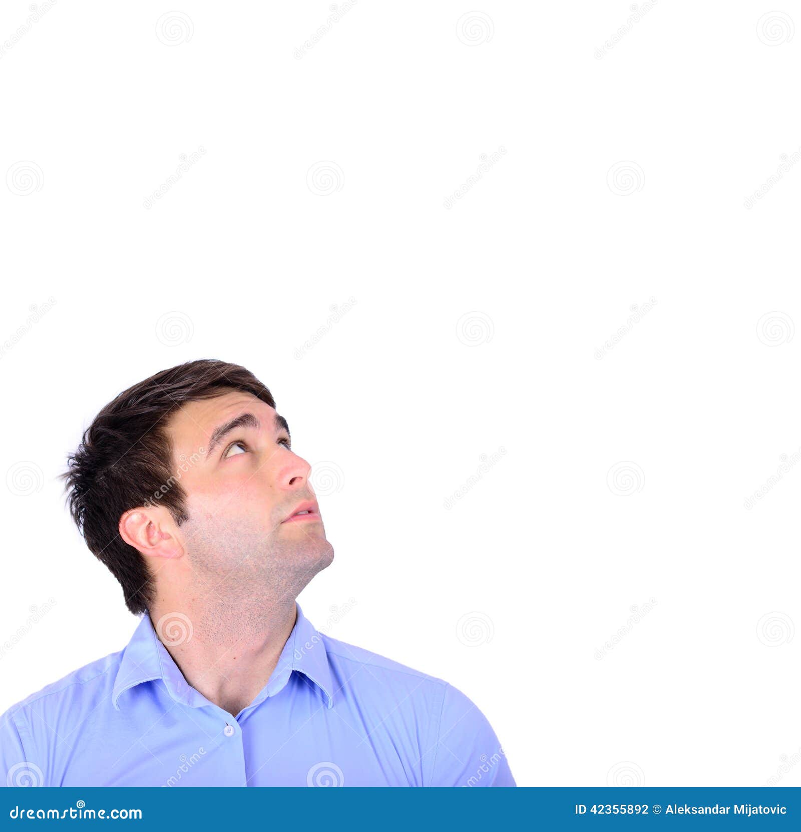 Portrait of Handsome Young Man Looking Up Isolated on White Stock Photo ...