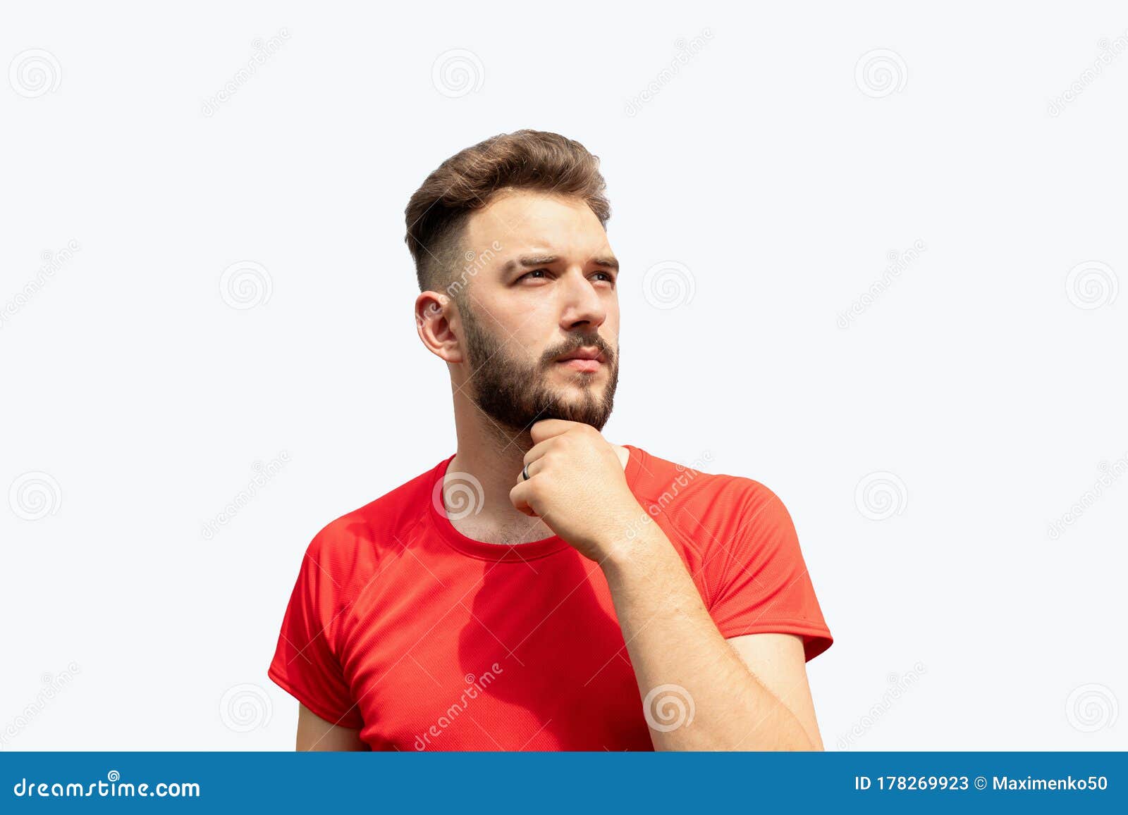 Portrait of Handsome Young Man Looking Up Thoughtfully Isolated on ...