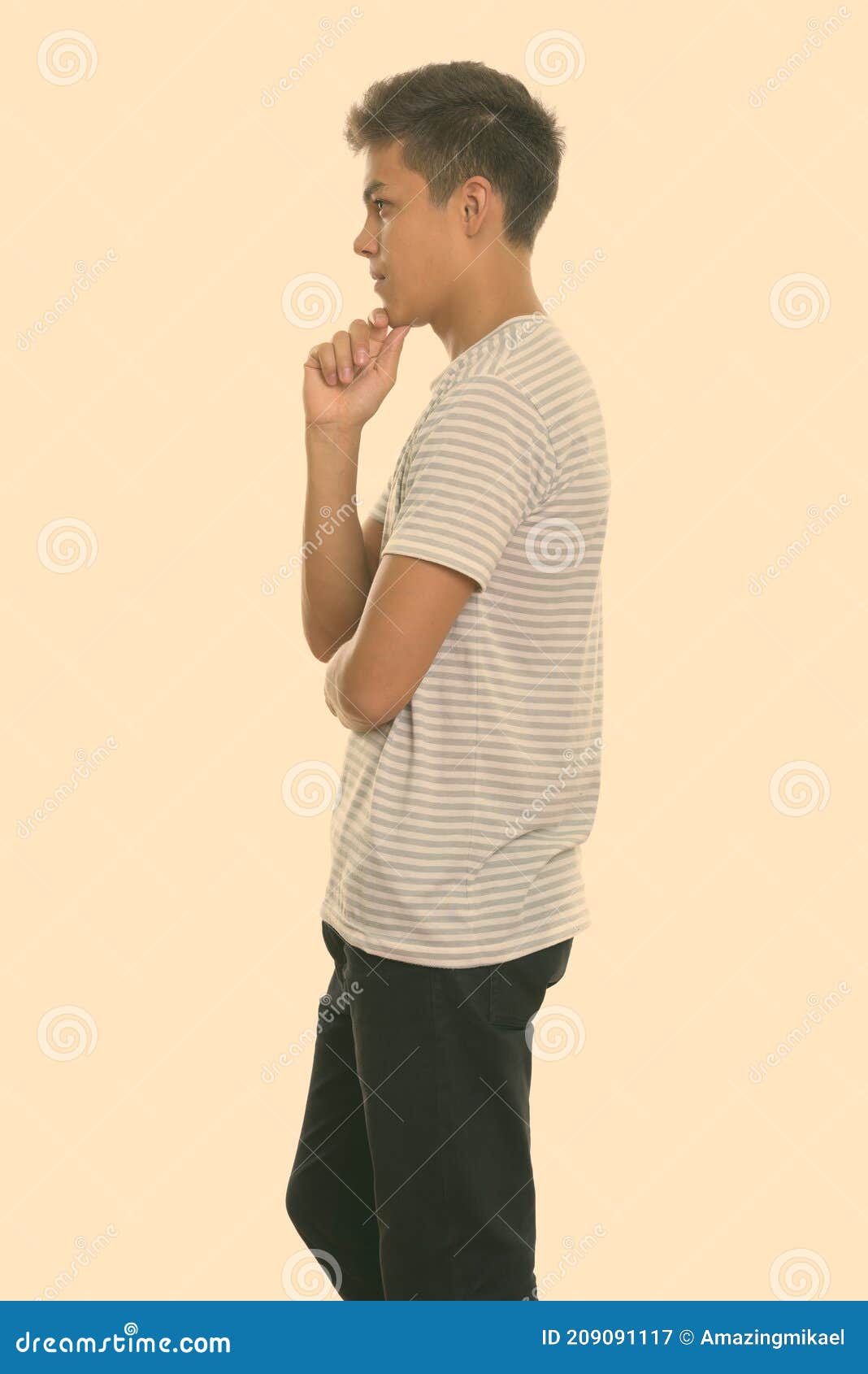 Profile View of Young Handsome Man Standing while Thinking Stock Image ...