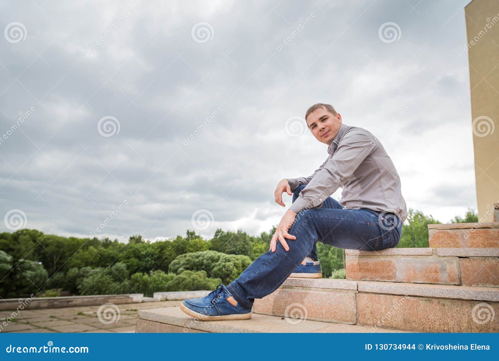 Portrait of Handsome Young Man on the Steps Stock Photo - Image of ...
