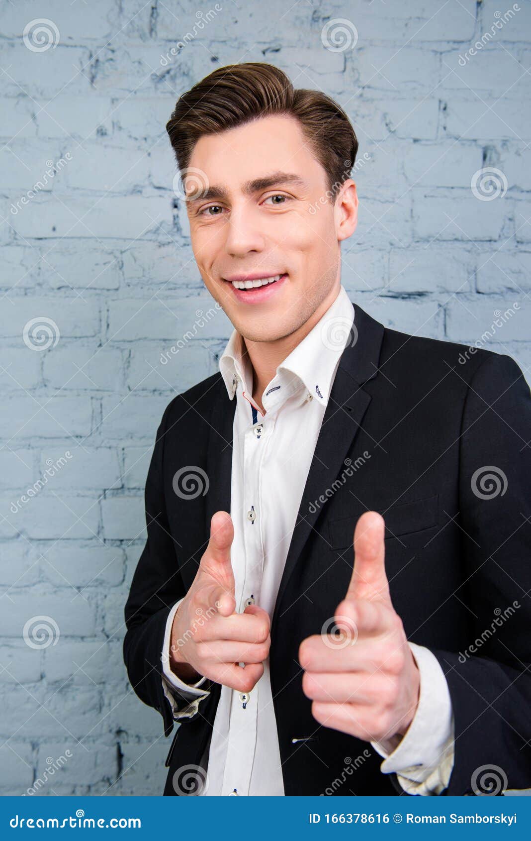 Portrait of Handsome Young Man in Suit Pointing on Camera Stock Photo ...