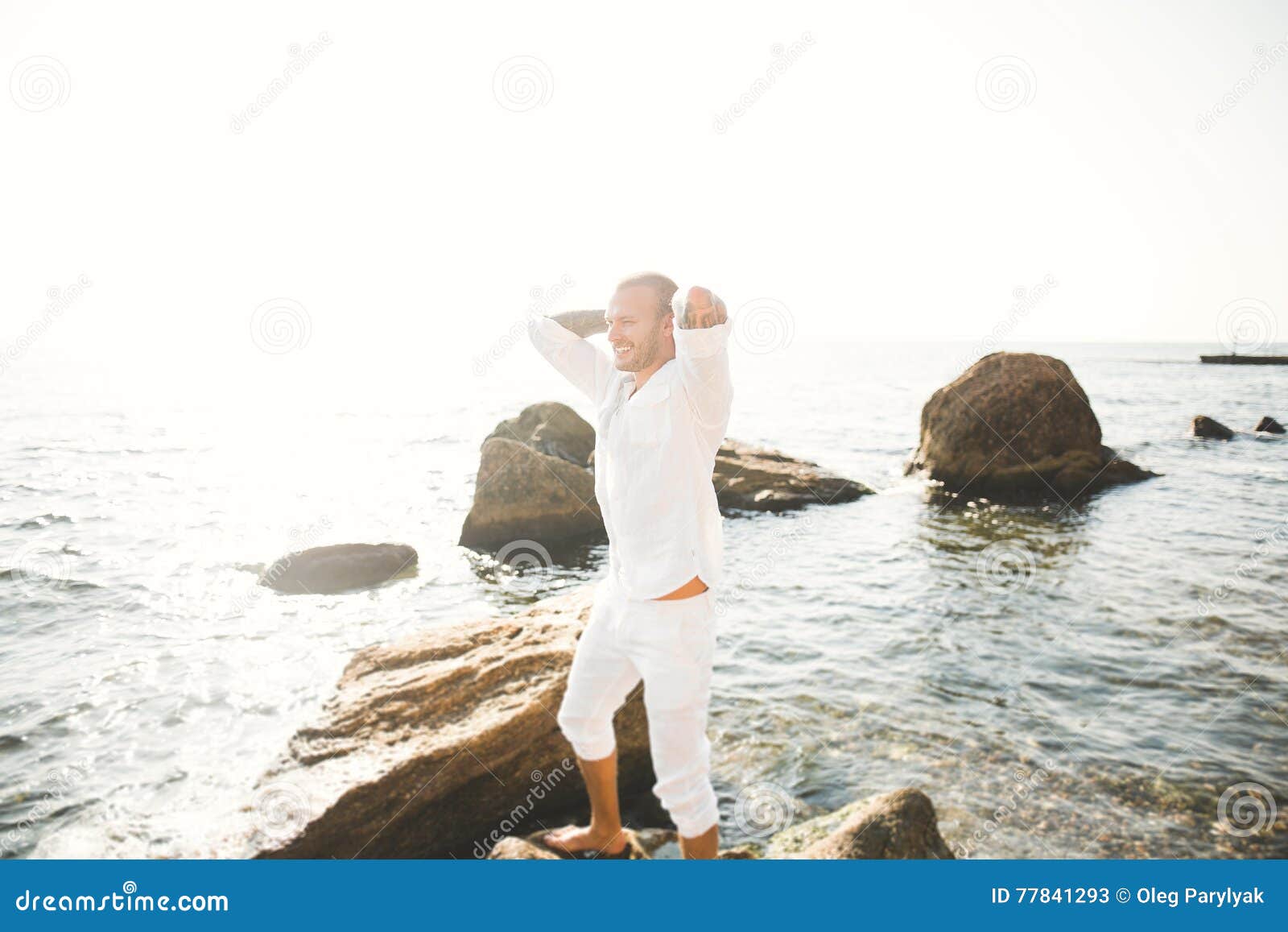 Portrait of a Handsome Young Man in the Sun by the Sea Stock Image ...