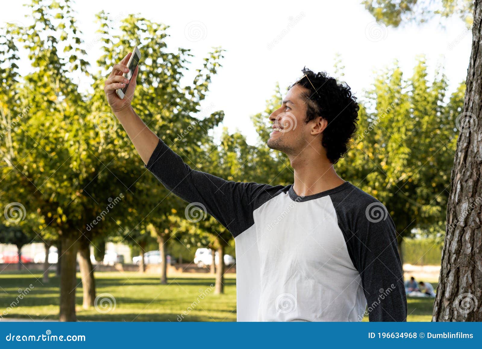 Portrait of Handsome Young Man Using His Mobile Stock Photo - Image of ...