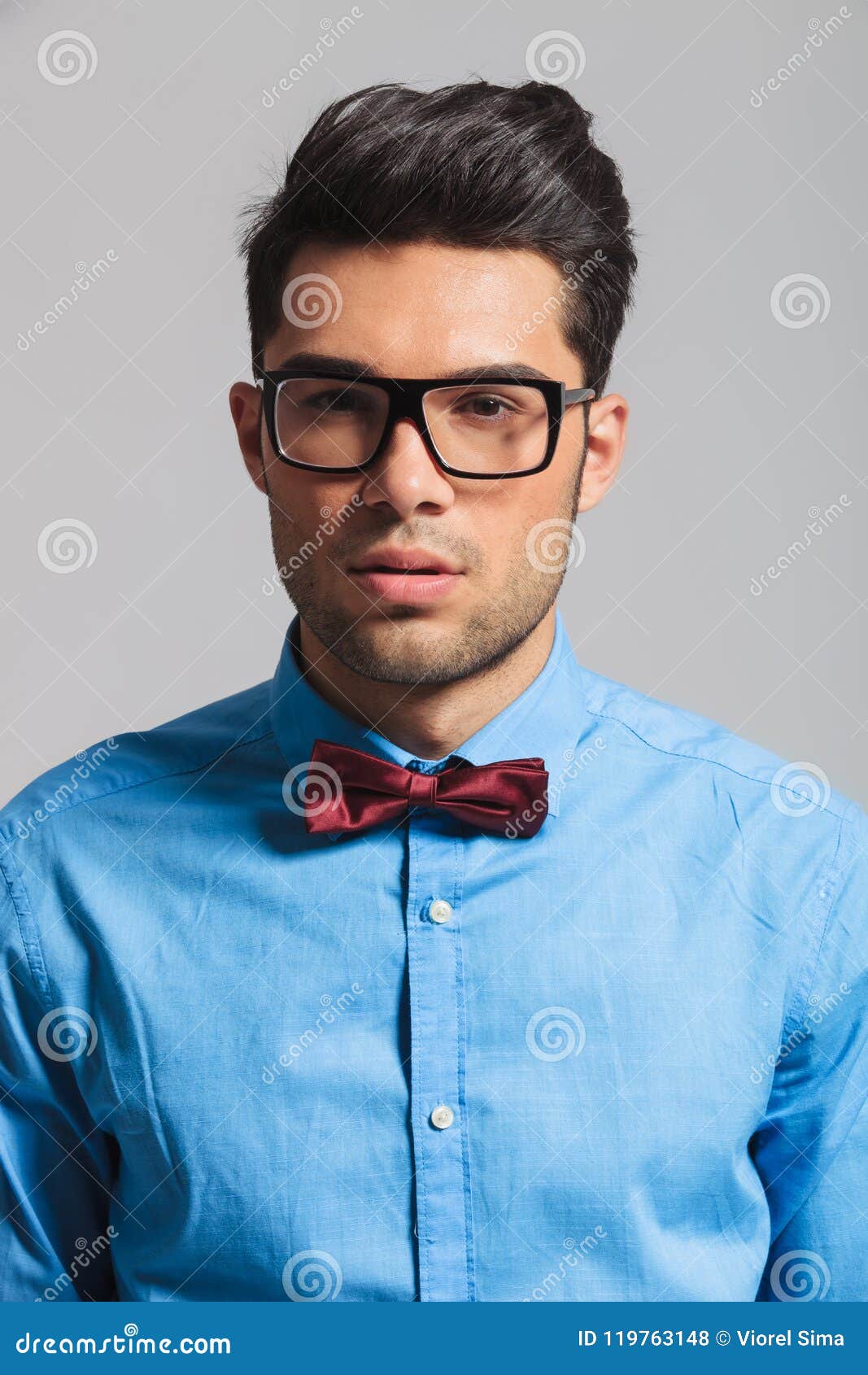 Portrait Of Handsome Young Student With Glasses And Bowtie Stock Photo ... Portrait Of Handsome Young Student With Glasses And Bowtie Stock Photo ...