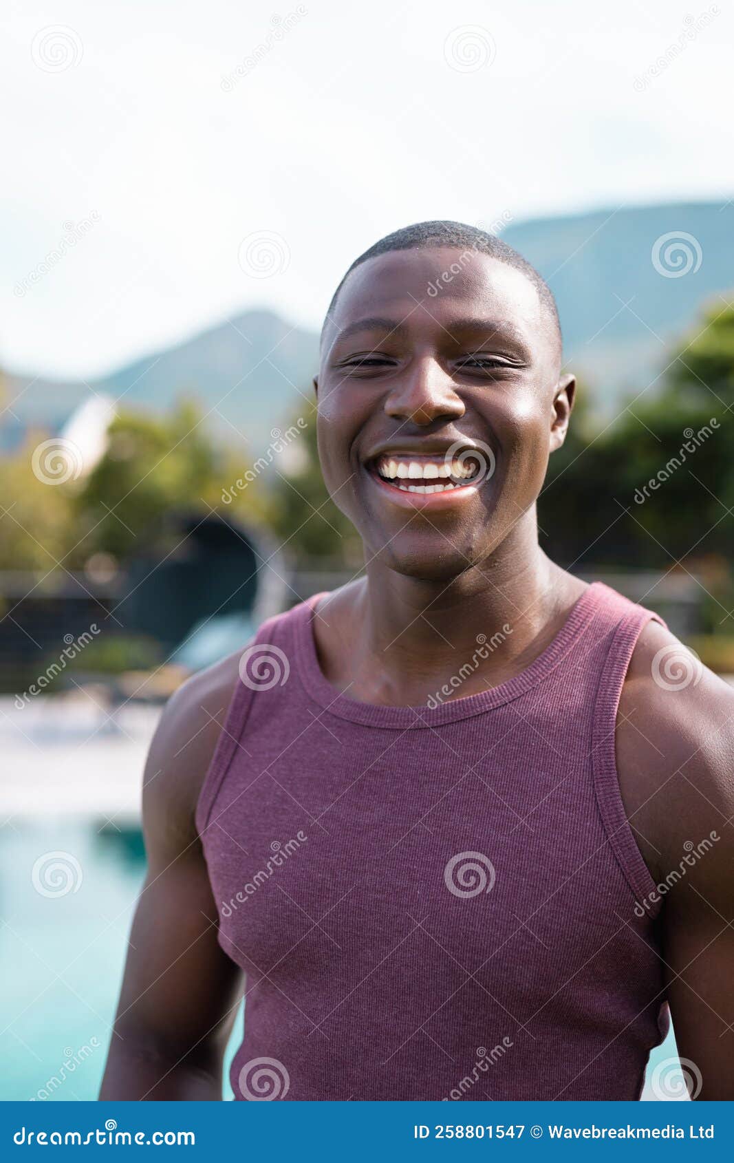 Portrait Of Happy African American Man Smiling In Garden Stock Image